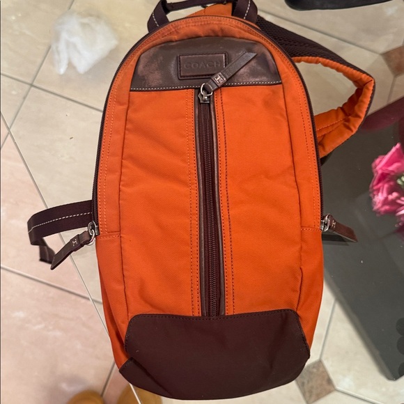 Bags | Coach Vintage Varick Sling Backpack | Poshmark